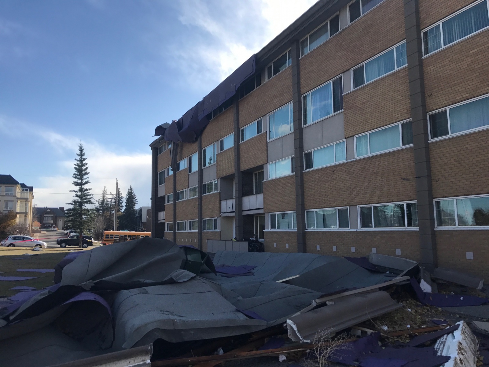 File:Wind - Calgary roof blow-off (2).JPG - RCABC Roofing Practices Manual